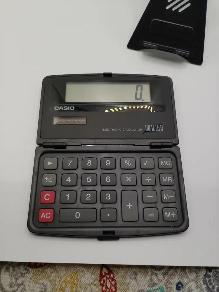 Casio SL-200L Flip Calculator Electronic Dual Leaf Two Way Power